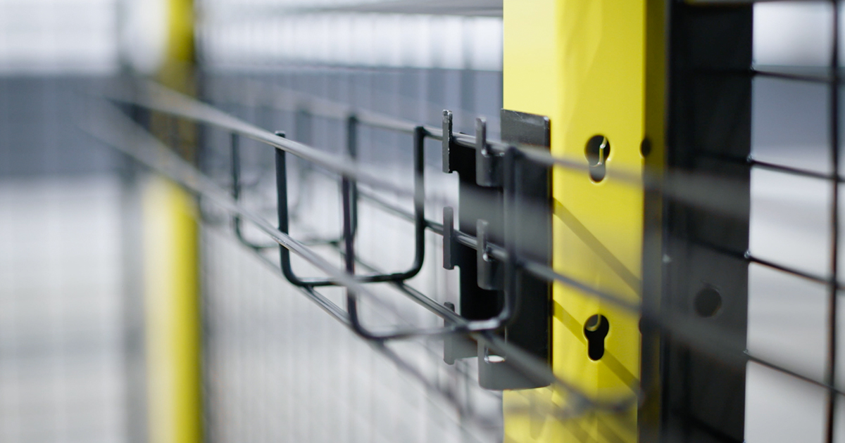 Installation of X-Tray Bracket - in the pre-drilled holes